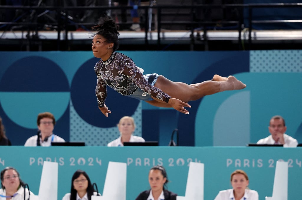 Paris Olympics: US gymnast Simone Biles shakes off leg injury to ...